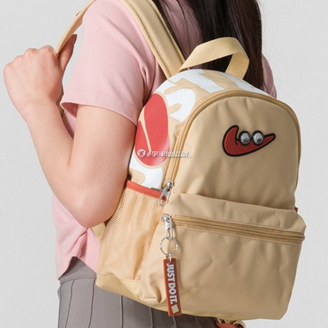 Nike NIKE children's new big eye style casual mini backpack FZ7259-272-300