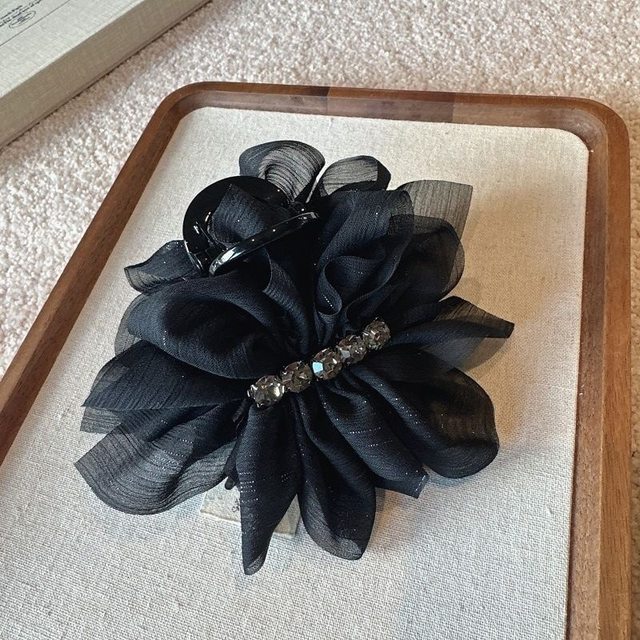 Korean style mesh flower clip for women with hair in a bun on the back ...