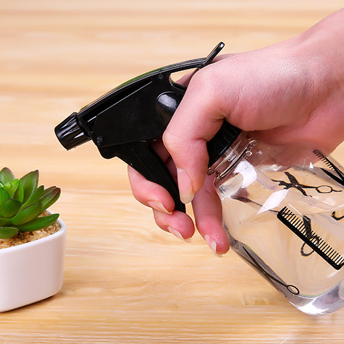 Hand pressing fine mist spraying can household small flower watering ...