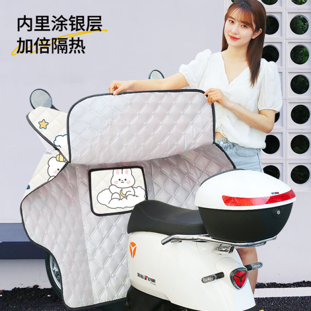Small electric bike sun protection and wind protection are covered by ...