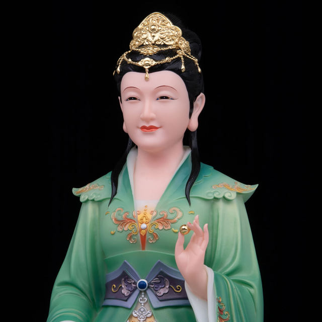The statue of Hu Xiuying, the goddess of Hu family, is white marble ...