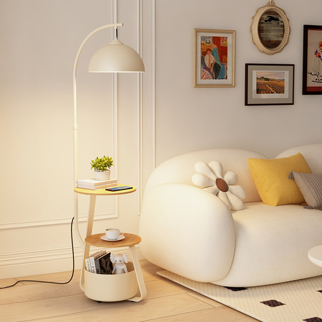 French cream wind sofa next to the side cabinet bedside of the bedside ...