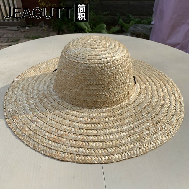 Farmer's handmade wheat straw straw hat with large brim for outdoor ...