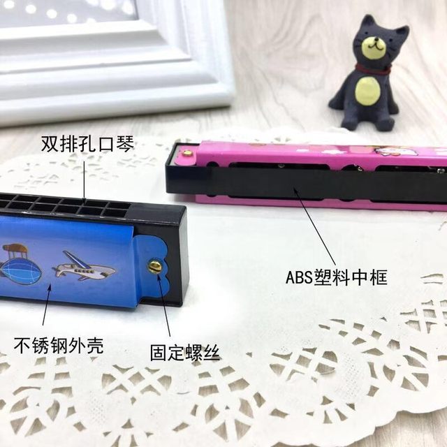 1 16-hole children's tin harmonica