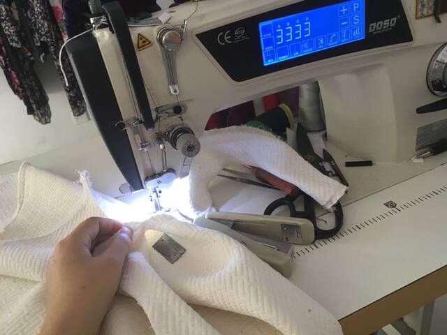 Professional tailors store to modify clothes, suits, shoulder width ...