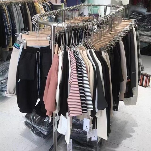 Children's clothing store stainless steel brushed mid -island display ...