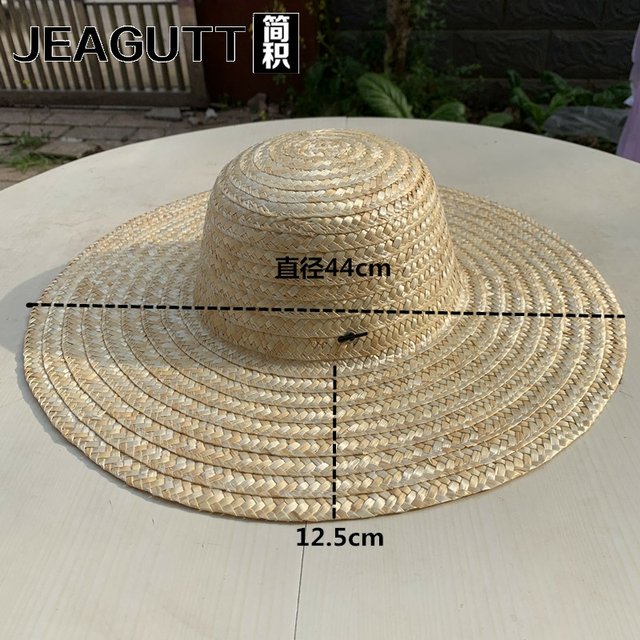 Farmer's handmade wheat straw straw hat with large brim for outdoor ...