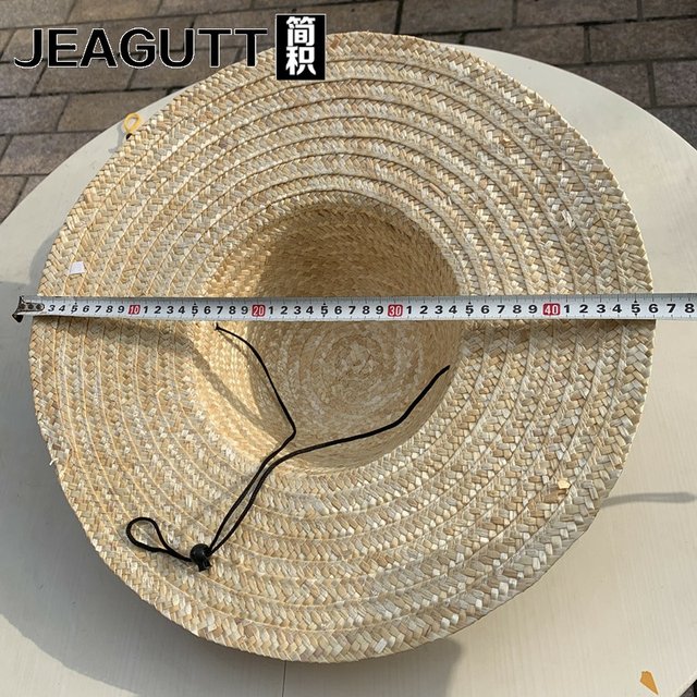 Farmer's handmade wheat straw straw hat with large brim for outdoor ...