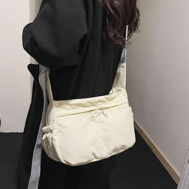 Waterproof nylon cloth dumpling bag men's and women's same messenger ...
