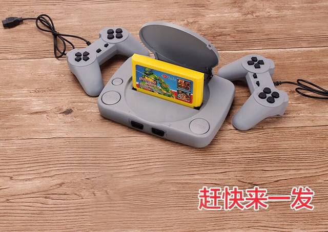 Retro 8-bit game console with yellow card inserted, old-fashioned ...