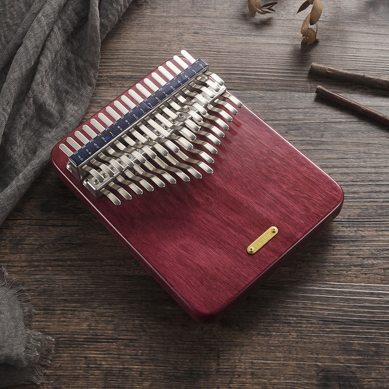 Listen to Snow 17-Key 34-Tone Kalimba Thumb Piano - Perilla Wood