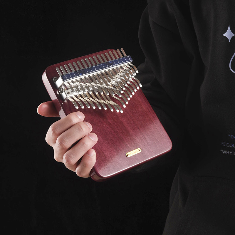 Listen to Snow 17-Key 34-Tone Kalimba Thumb Piano - Perilla Wood