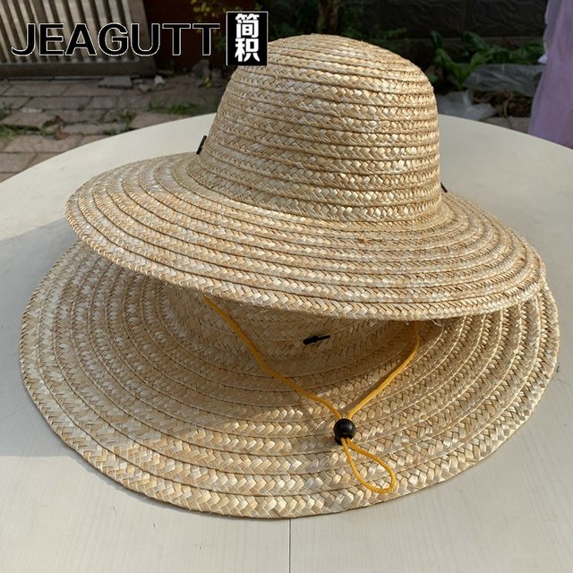 Farmer's handmade wheat straw straw hat with large brim for outdoor ...