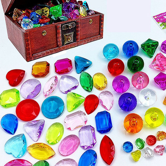 Children's toys, gemstones, crystals, diamonds, pirate treasure box ...