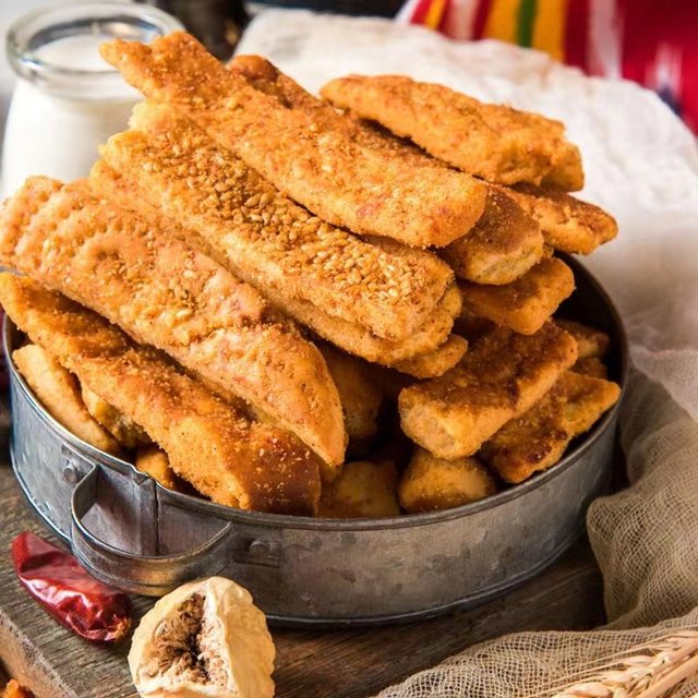 Xinjiang specialty cumin baked cake cake sesame sauce pot stir -frying ...