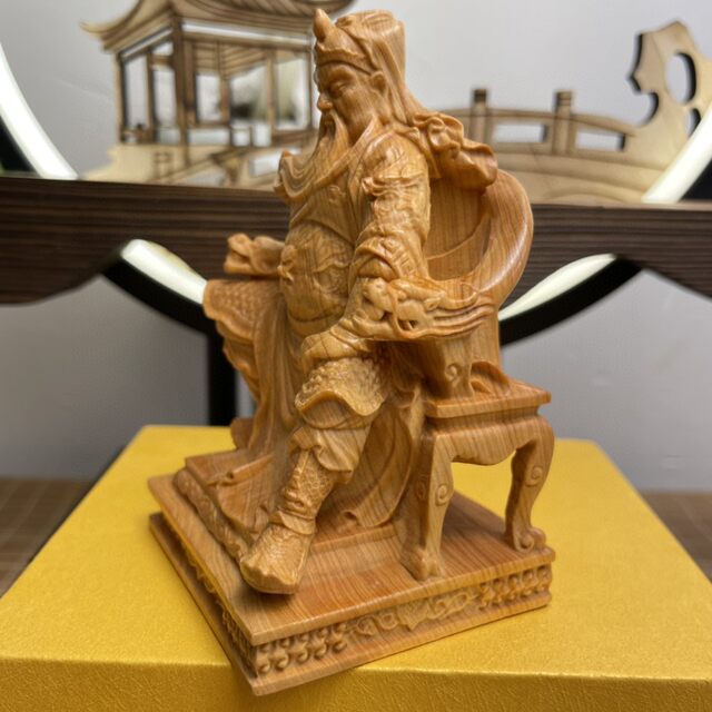 Cliff cypress wood carving sitting in Guan Gong reading Spring and ...