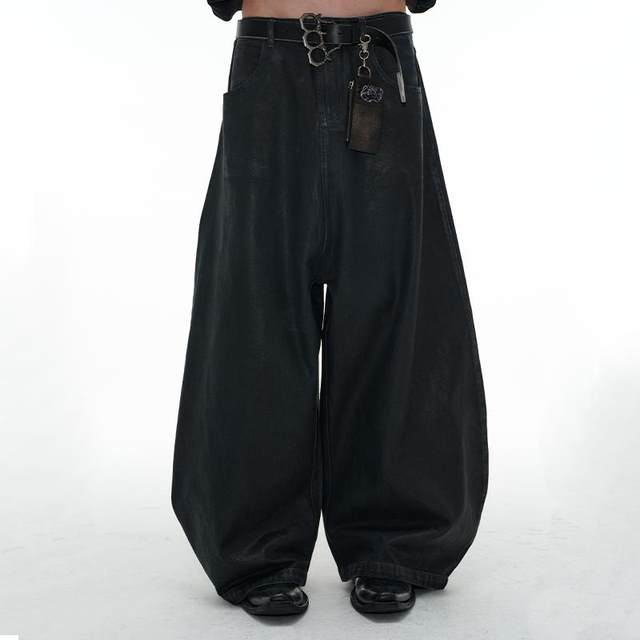 JCAESAR COATING DENIM low-crotch waxed scimitar jeans, washed blue base fabric, stacked black wax