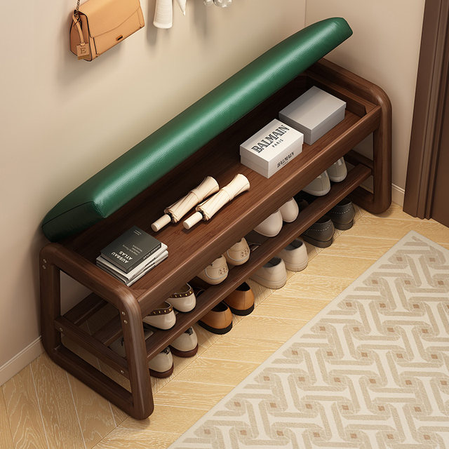 Solid wood shoe-changing stool at the entrance to the home, where you ...