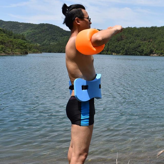 Adult boys and girls learning swimming equipment beginners floating ...