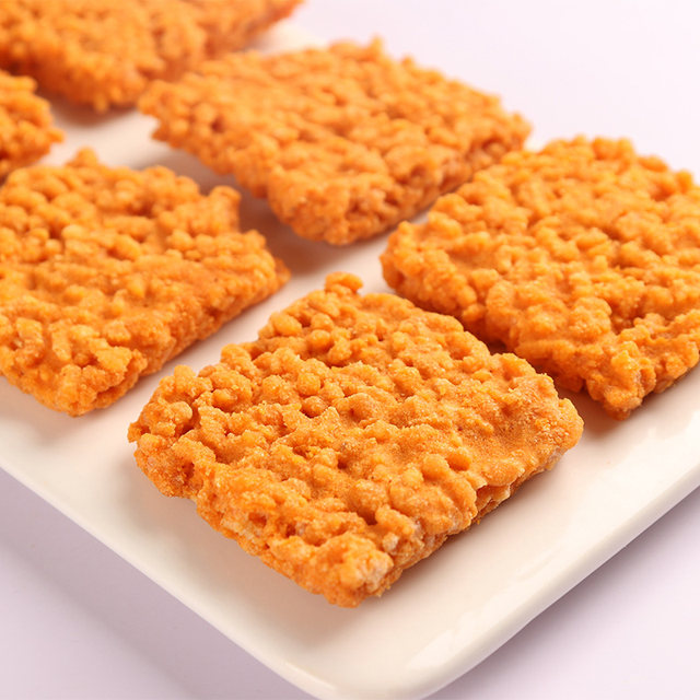 Crab-scented salted egg yolk glutinous rice crispy snacks in small ...