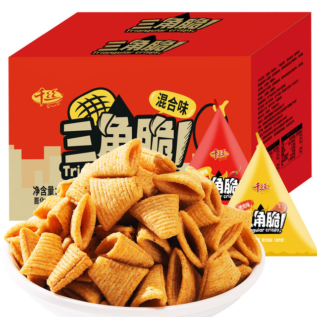 Thousands of triangular crisps, whole box of sharp-cornered puffed ...