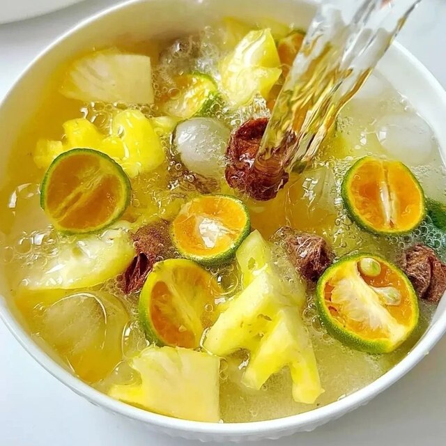 Sweet and sour plums soaked in salted water, candied plums, snacks for ...