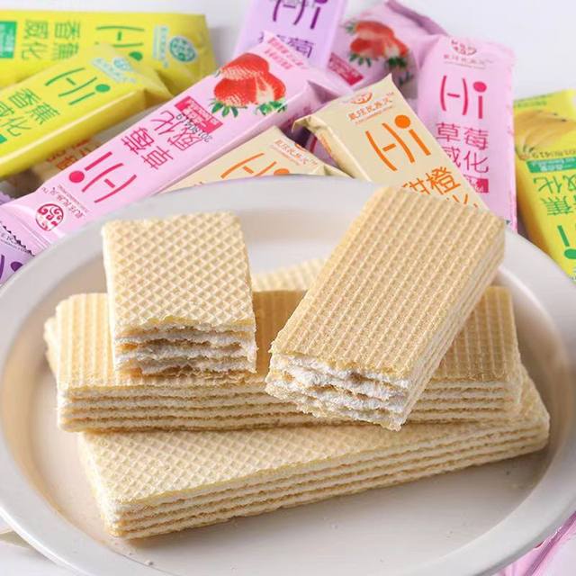 Chocolate wafer biscuit coating sandwich containing nuts and fruit ...