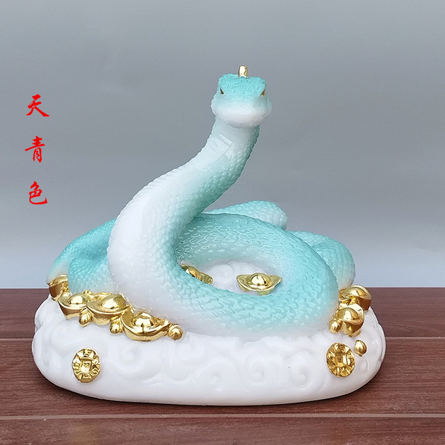 White marble black and white python real body sitting on the mountain ...