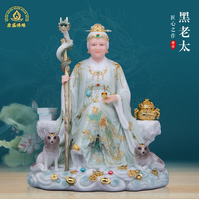The statue of the black old lady in the mountain is decorated with ...