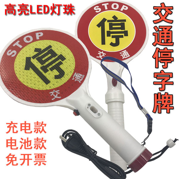 Traffic stop sign with hand holding slow to check and at intersection ...