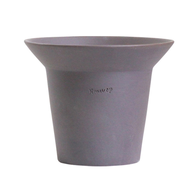 Wabi-sabi style ceramic flower pot with high legs and breathable plant ...