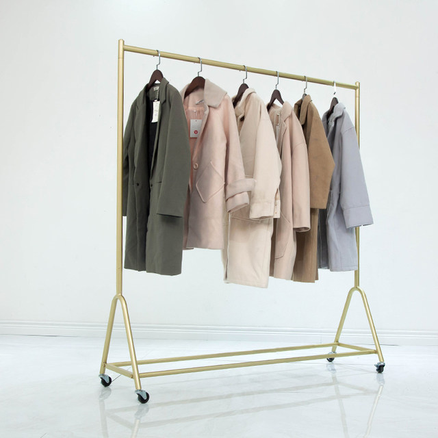Golden clothing store hanger display racks, stalls underground children ...