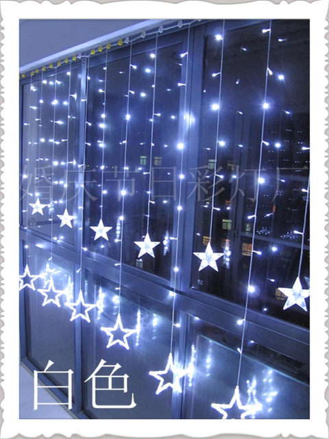 Small colorful lights flashing string lights decorate romantic bedroom ...