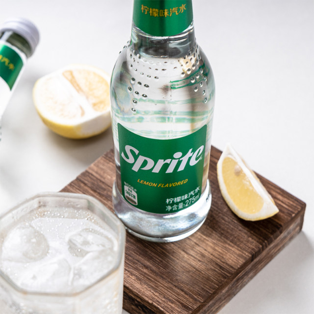 Coca-Cola Sprite carbonated drink lemon flavored soda glass bottle ...