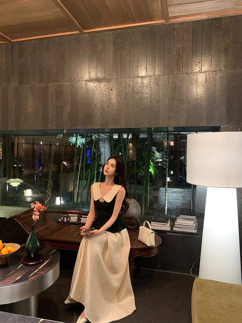 Muzili's Li Haijun collar black sleeveless top for women's spring and summer skirt two-piece suit