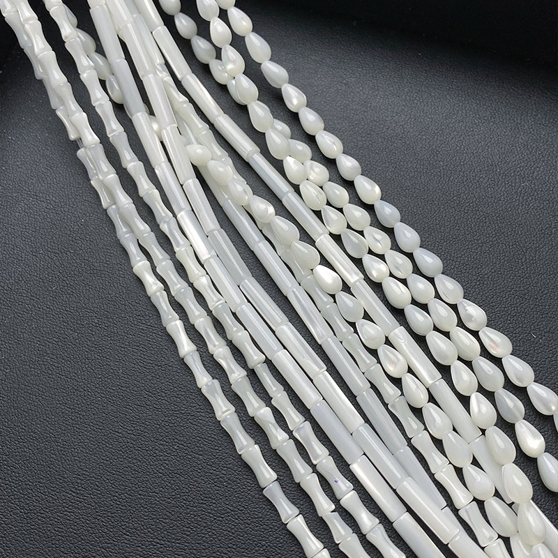 Natural shells, horseshoe snails, bamboo round tube beads, water ...