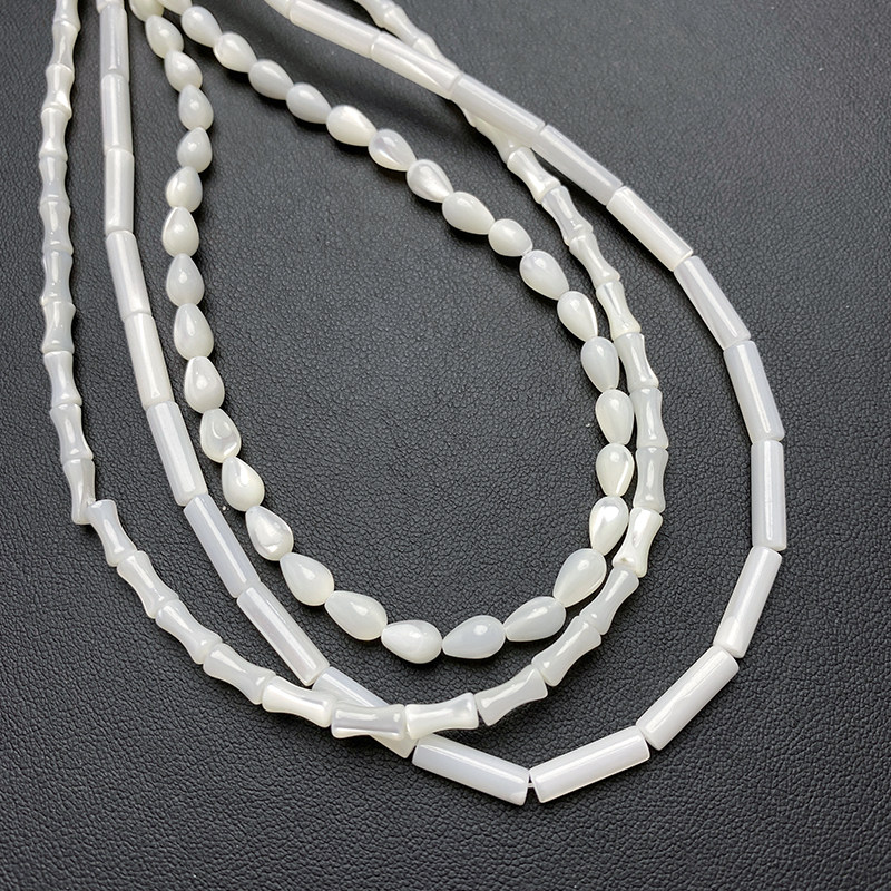 Natural shells, horseshoe snails, bamboo round tube beads, water ...