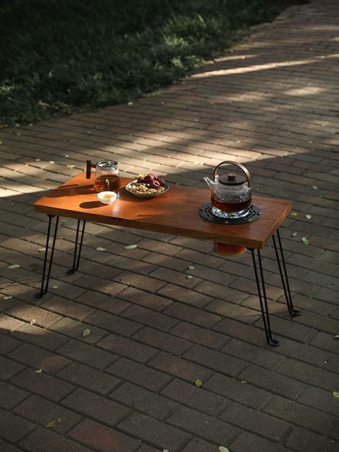 Picnic camping outdoor tea table old elm wood stove making tea cassette ...