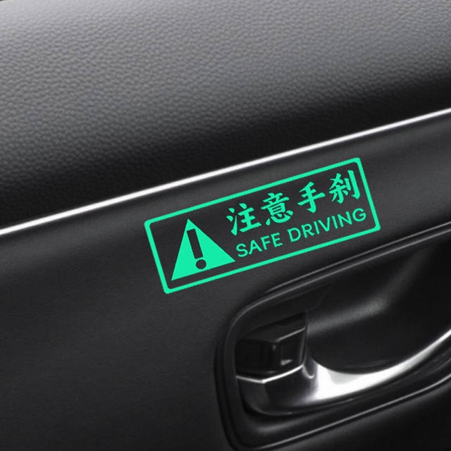Pay attention to the handbrake text sticker in the car, luminous ...
