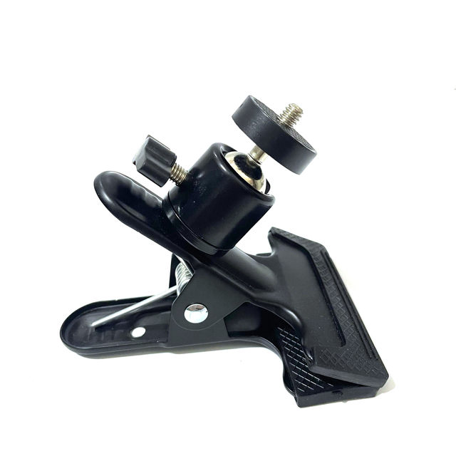 Spherical pan/tilt vigorously clamps metal pan/tilt clip camera flash ...
