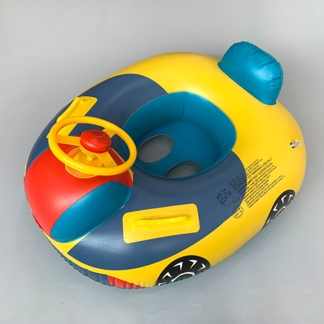 Baby sitting in the ring swimming ring inflatable mount child seat baby ...