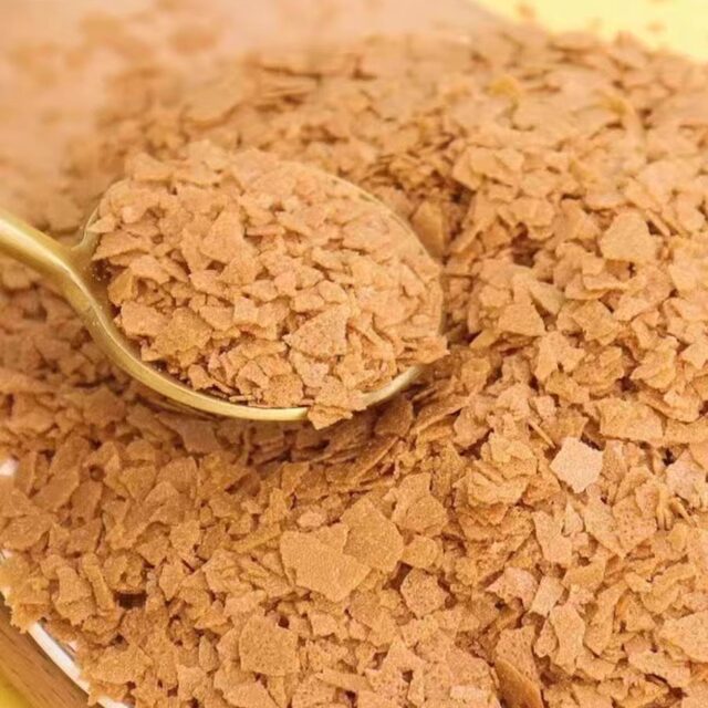 Butter flakes baked biscuits crushed cake decoration wood chaff cup ...