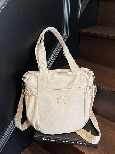 Korean version of large capacity solid color women's bag for spring outdoor commuting casual ...