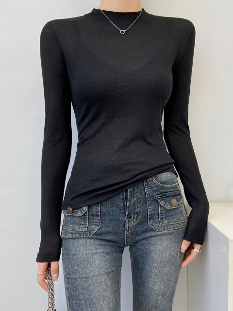 Gray half-high neck, slightly transparent wool base shirt for women in ...