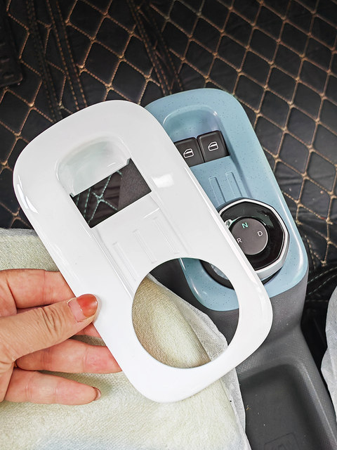 Special Geely Panda mini car interior modification armrest color change ...