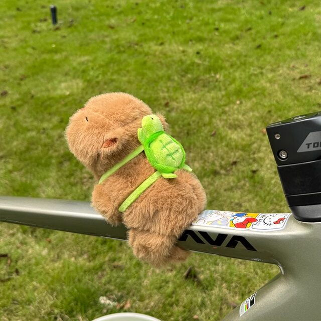 Kapibala car car pocket decorative ornaments capybara Buddha plush doll snap circle center ...