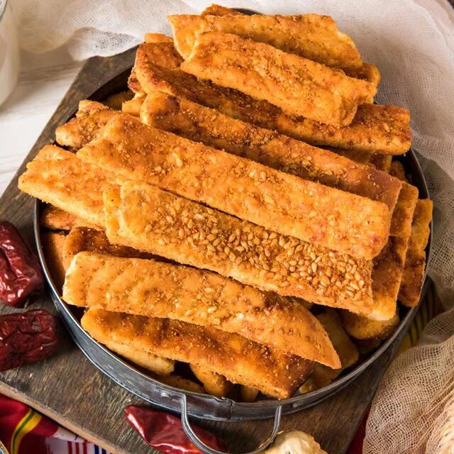 Xinjiang specialty cumin baked cake cake sesame sauce pot stir -frying ...