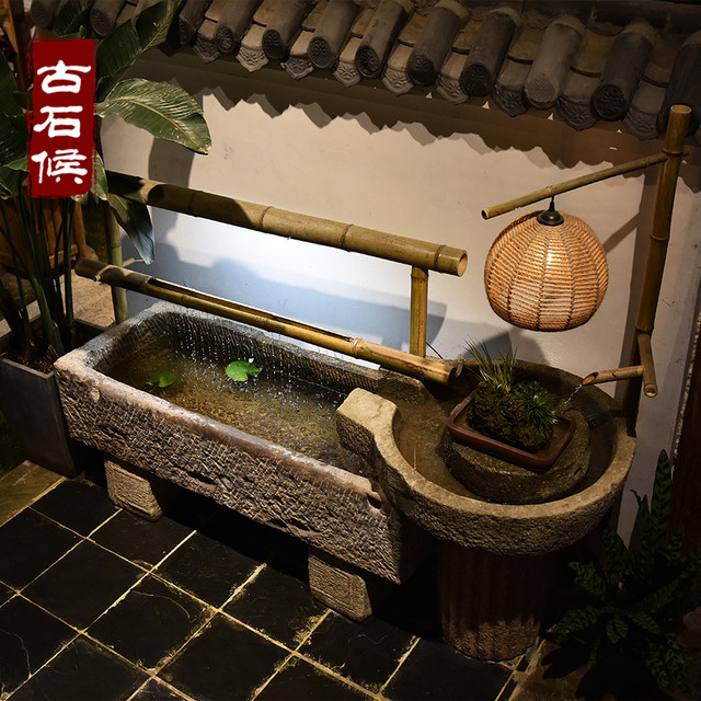 Old stone trough flowing water decoration landscaping combination ...