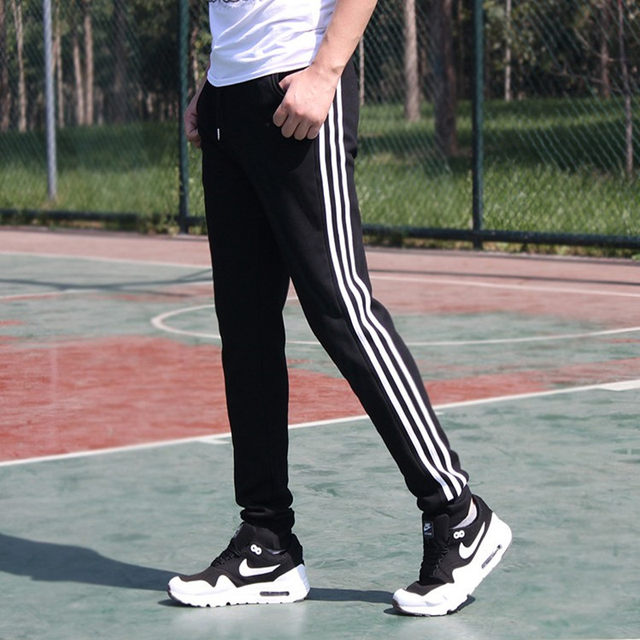 Velvet thickened polyester sweatpants men's winter windproof and warm ...