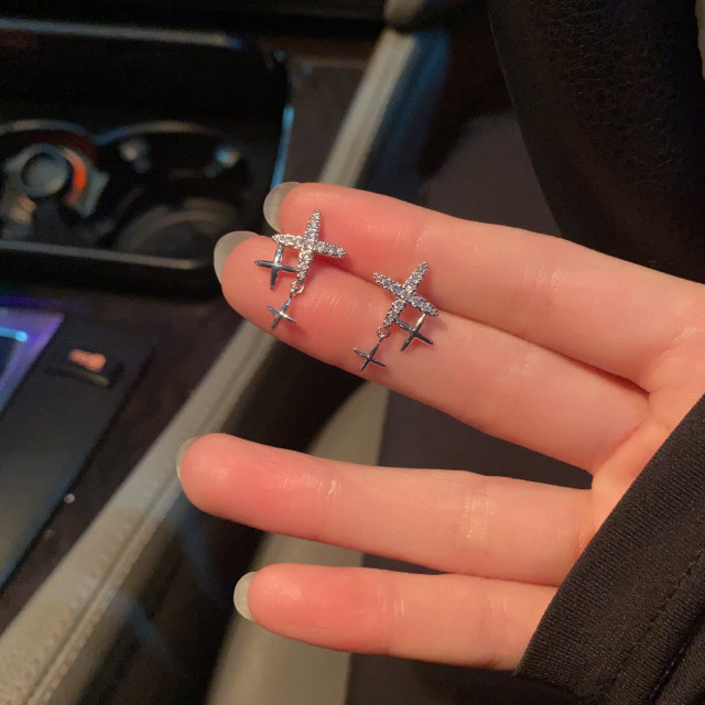 Small and exquisite copper inlaid zircon four-pointed star earrings for ...